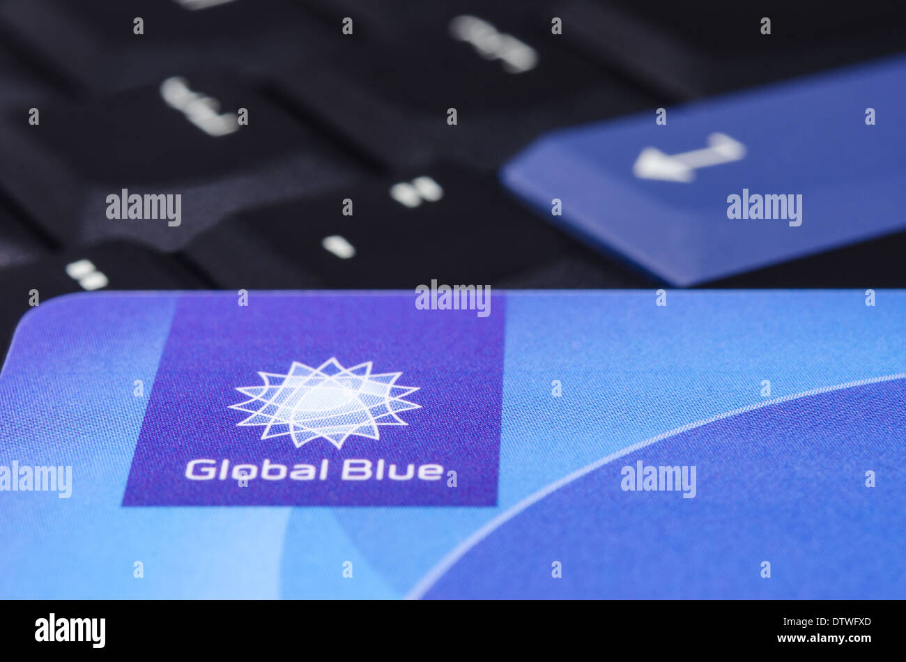 MUNICH, GERMANY - FEBRUAR 20, 2014: Global Blue closeup logo on plastic ...