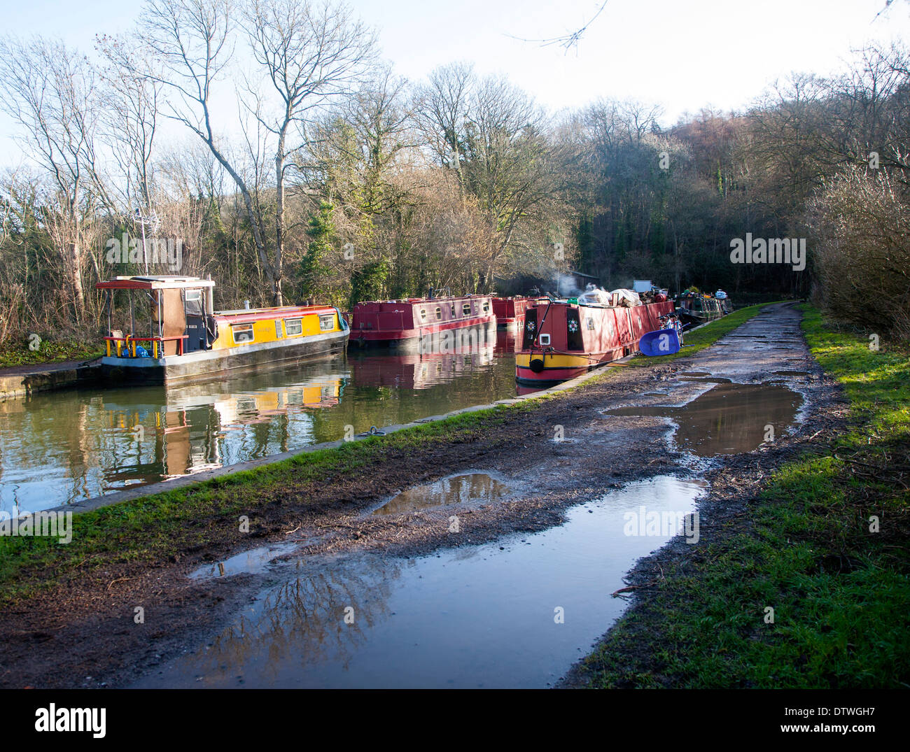 Narrow boats in winter on the Kennet and Avon canal, near Limpley Stoke ...