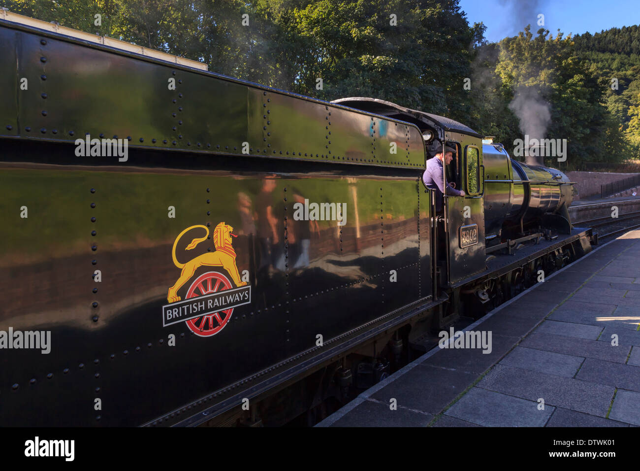 Ex GWR 2884 Class number 3802 is seen departing Llangollen Station ...