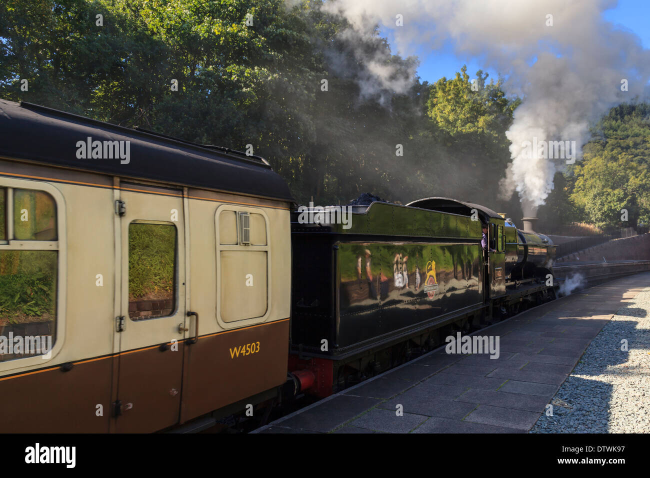 Ex GWR 2884 Class number 3802 is seen departing Llangollen Station ...