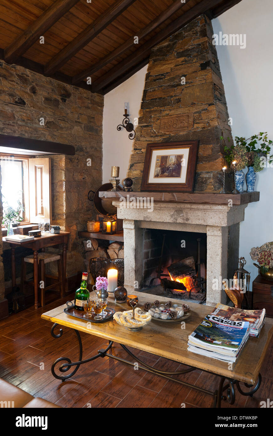 Fireplace at a rural-tourism house Stock Photo - Alamy