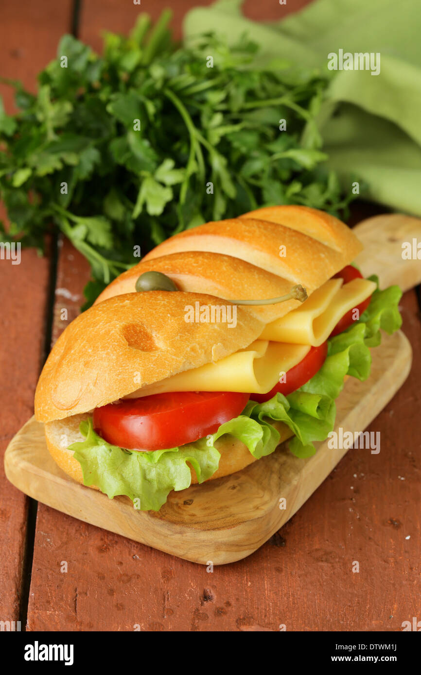 Fresh sandwich with vegetables, green salad and cheese Stock Photo - Alamy
