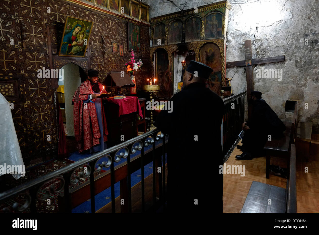 Ethiopian Orthodox priests and monks praying inside the Coptic Chapel ...