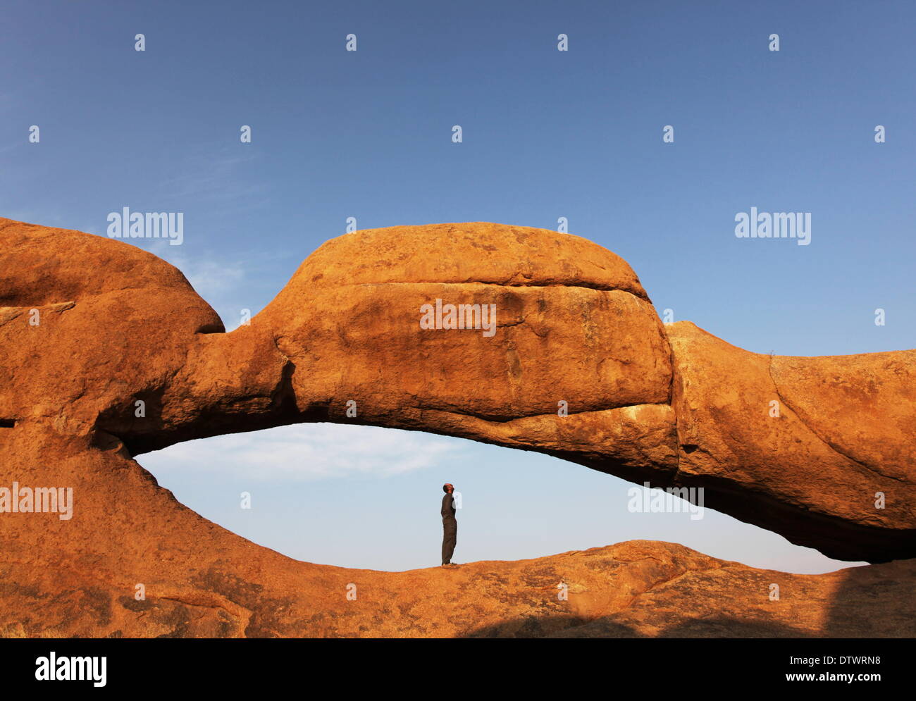 Man in arch Stock Photo - Alamy