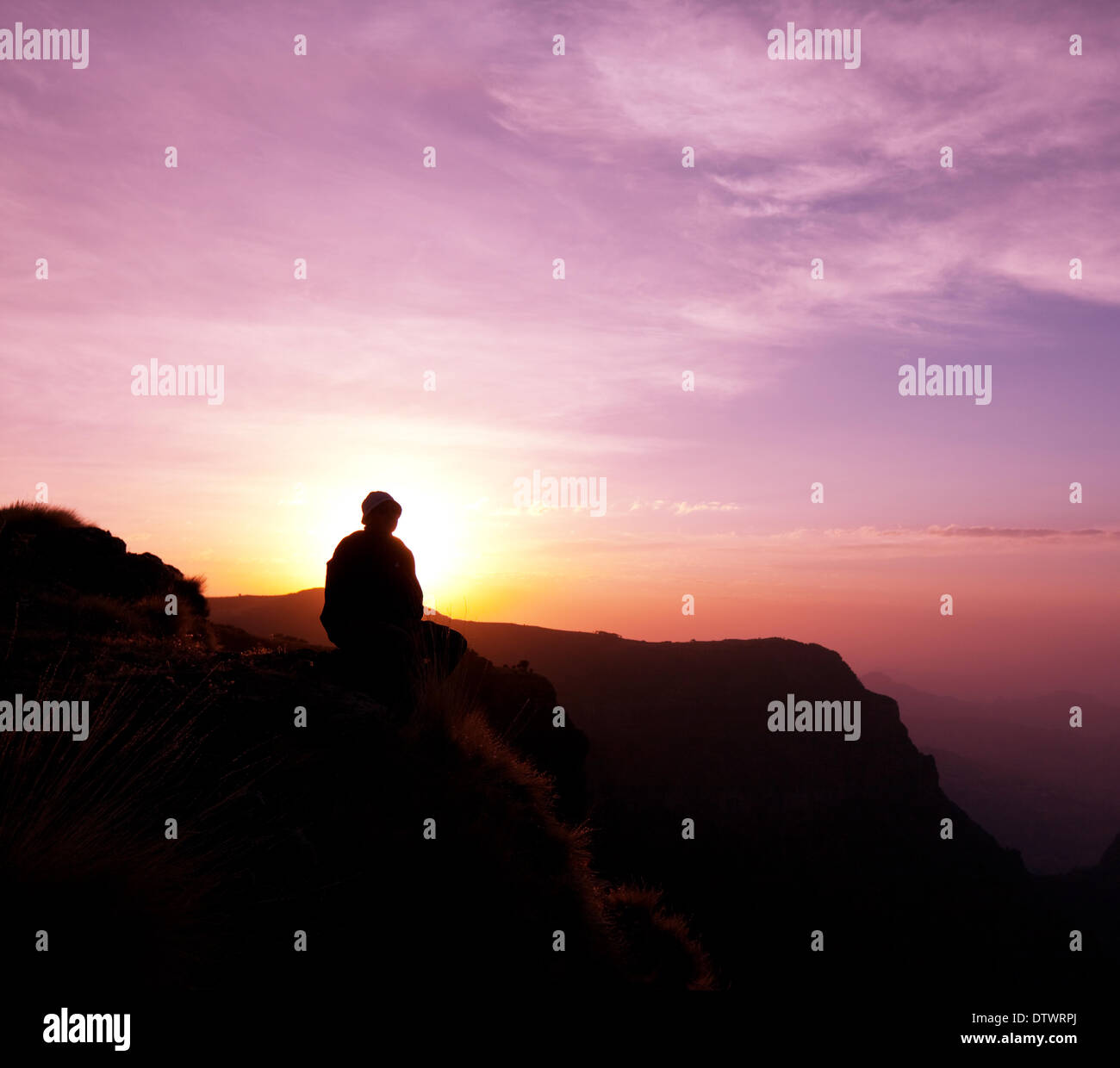 Man on the cliff Stock Photo - Alamy