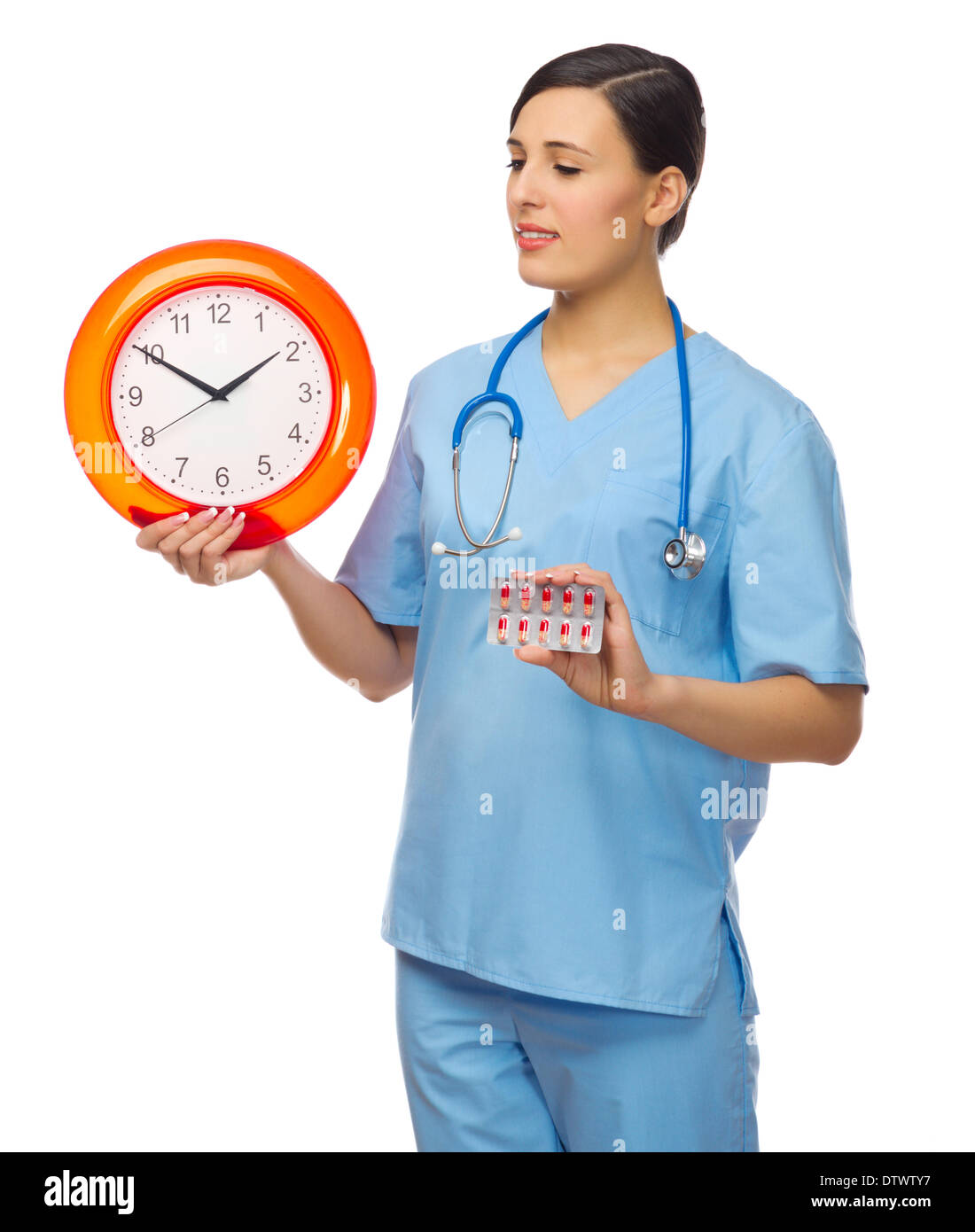 Doctor with clock and pills isolated Stock Photo - Alamy