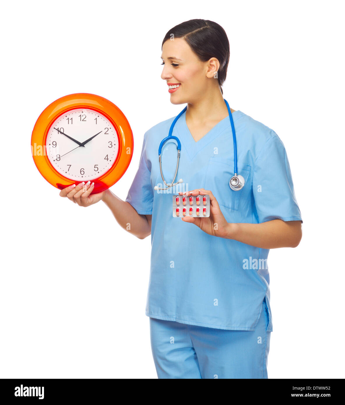 Young doctor with clock and pills isolated Stock Photo - Alamy