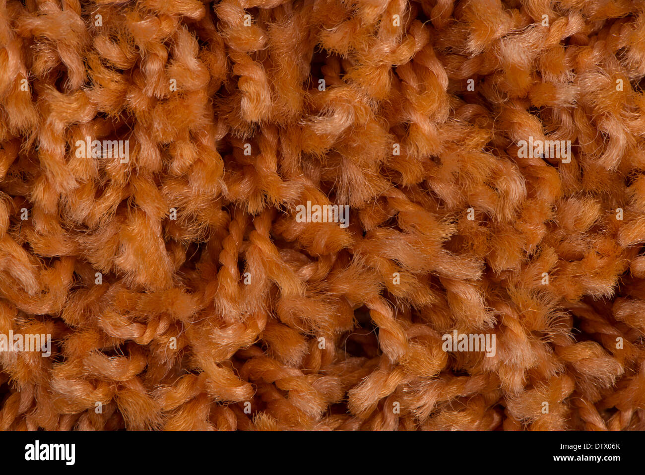 Closeup detail of orange carpet texture background Stock Photo - Alamy