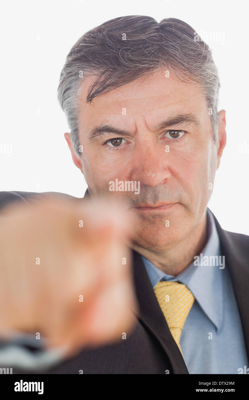 Angry businessman pointing Stock Photo - Alamy