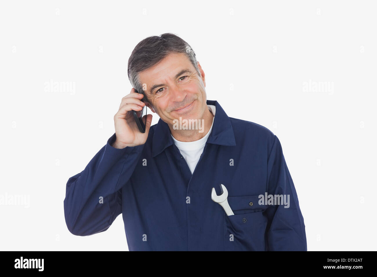 Portrait of mechanic on call Stock Photo - Alamy