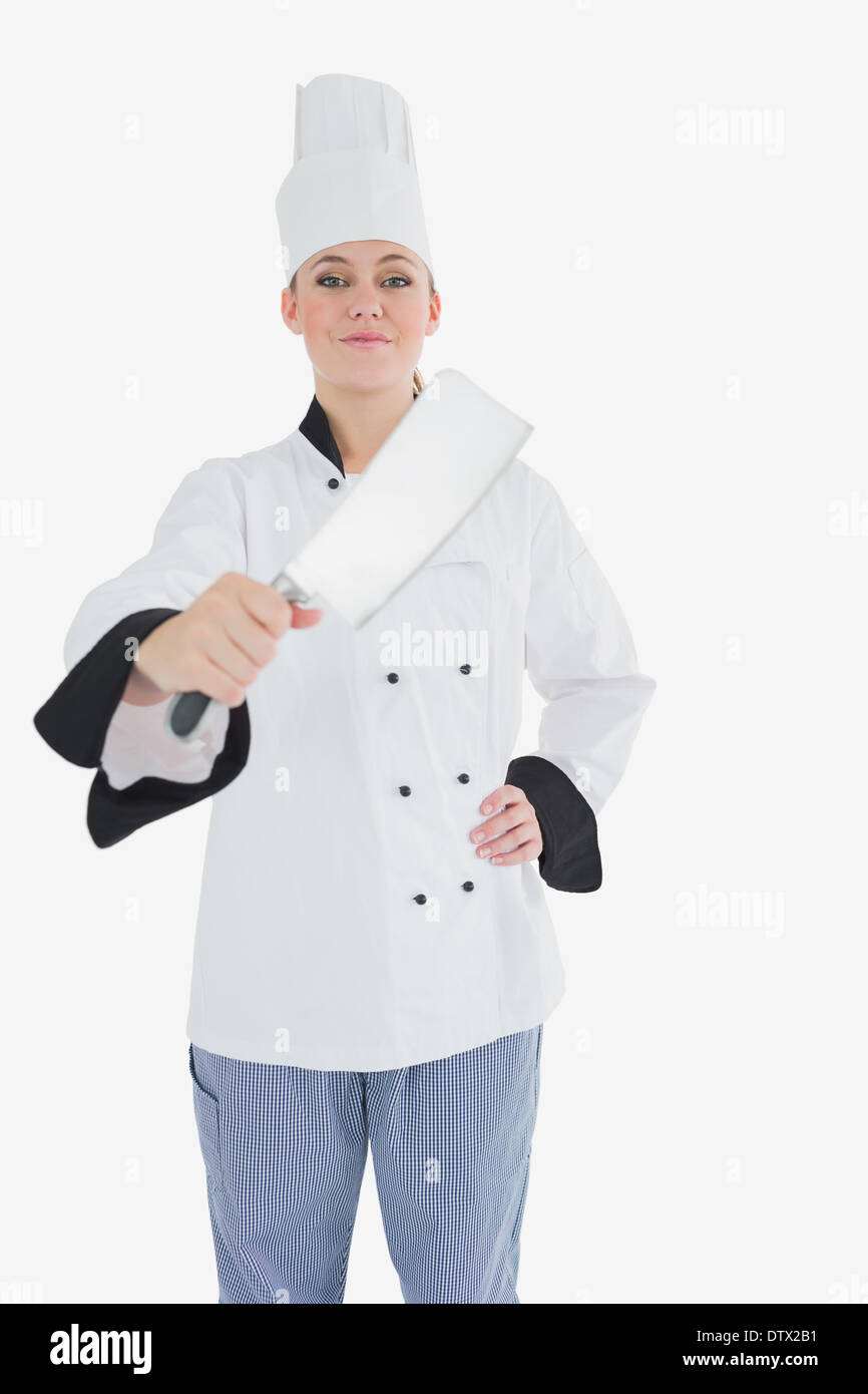 Portrait of female chef with meat cleaver Stock Photo - Alamy