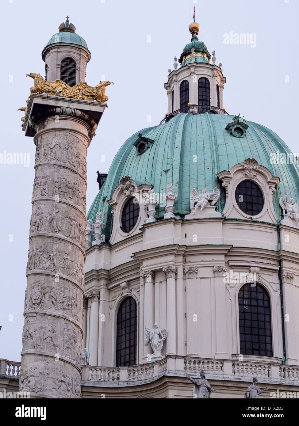 Copper dome and story tower at Karlskirche. The cross-topped dome and ...