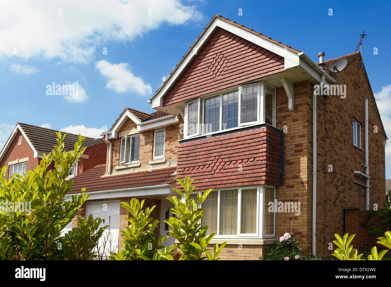 A typical English house with a garden Stock Photo - Alamy