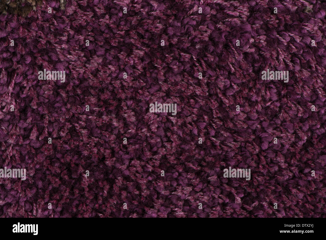 Closeup detail of purple carpet texture background Stock Photo - Alamy