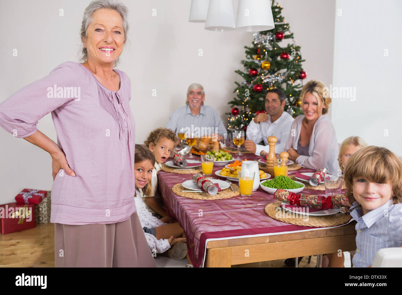 Standing beside table hi-res stock photography and images - Alamy