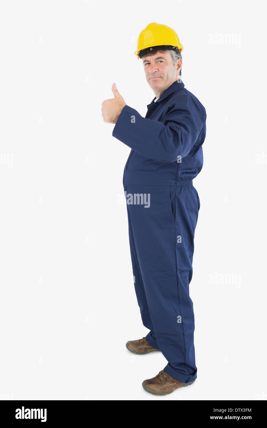 Mechanic showing thumbs up sign Stock Photo - Alamy