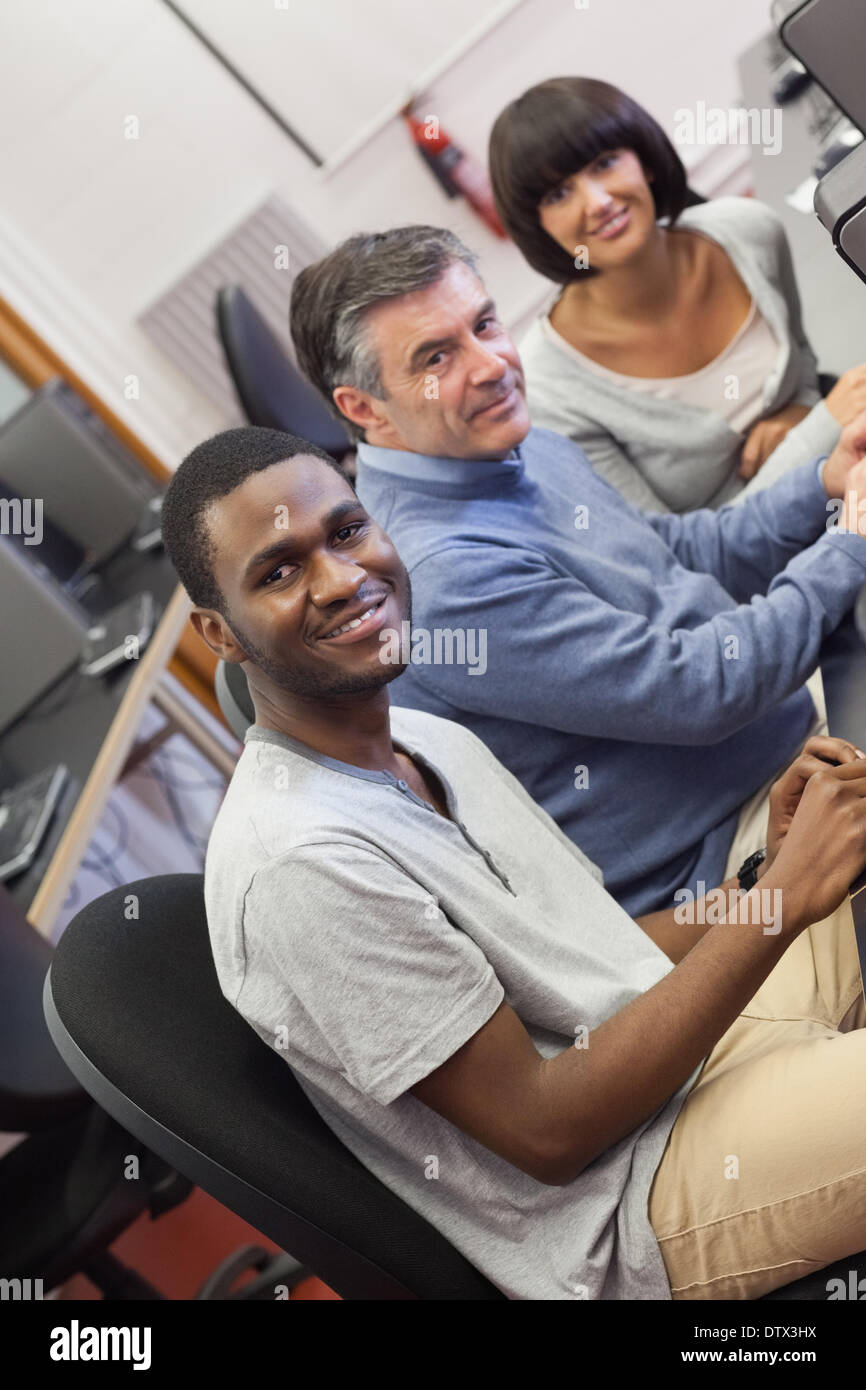 People sitting in the computer room Stock Photo - Alamy