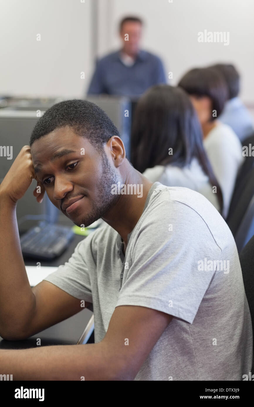 Man turning away from computer class Stock Photo - Alamy