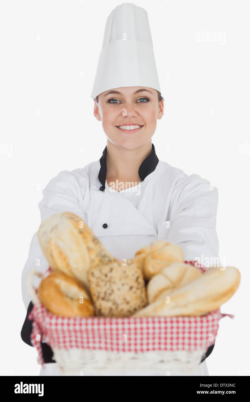 Young chef holding bread hi-res stock photography and images - Alamy