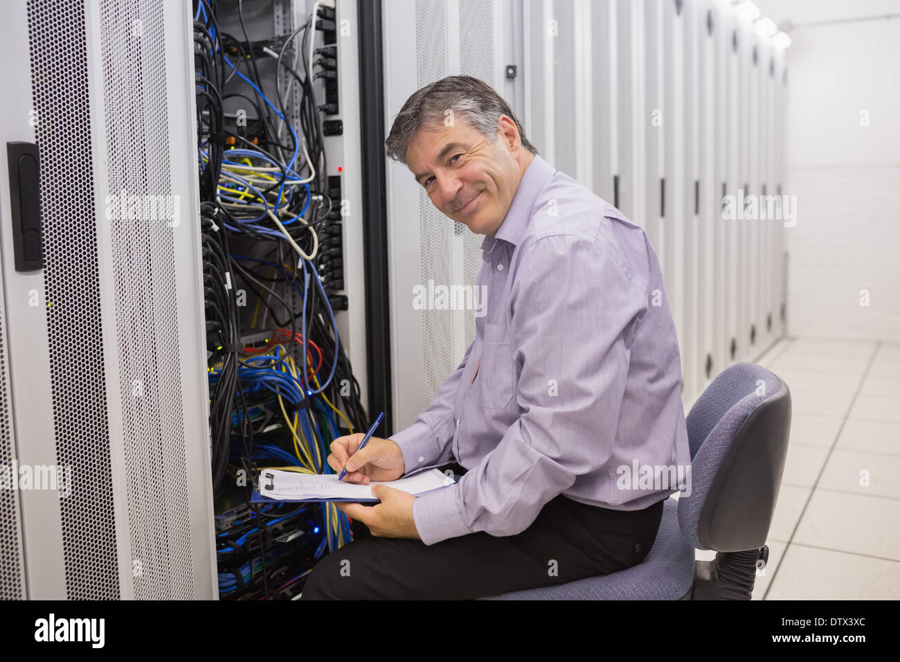 Technician checking camera data center hi-res stock photography and ...