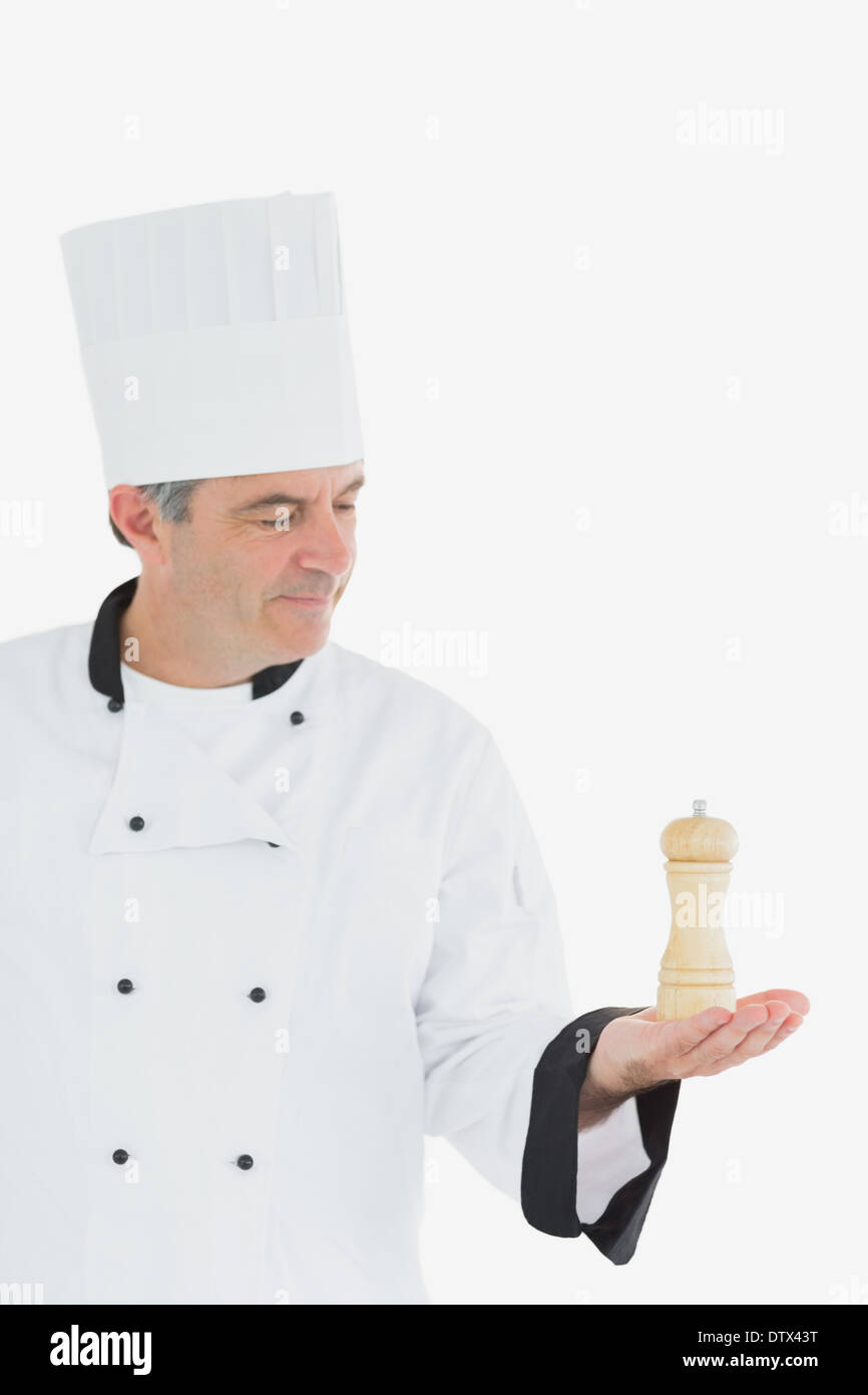 Chef holding salt shaker Stock Photo - Alamy