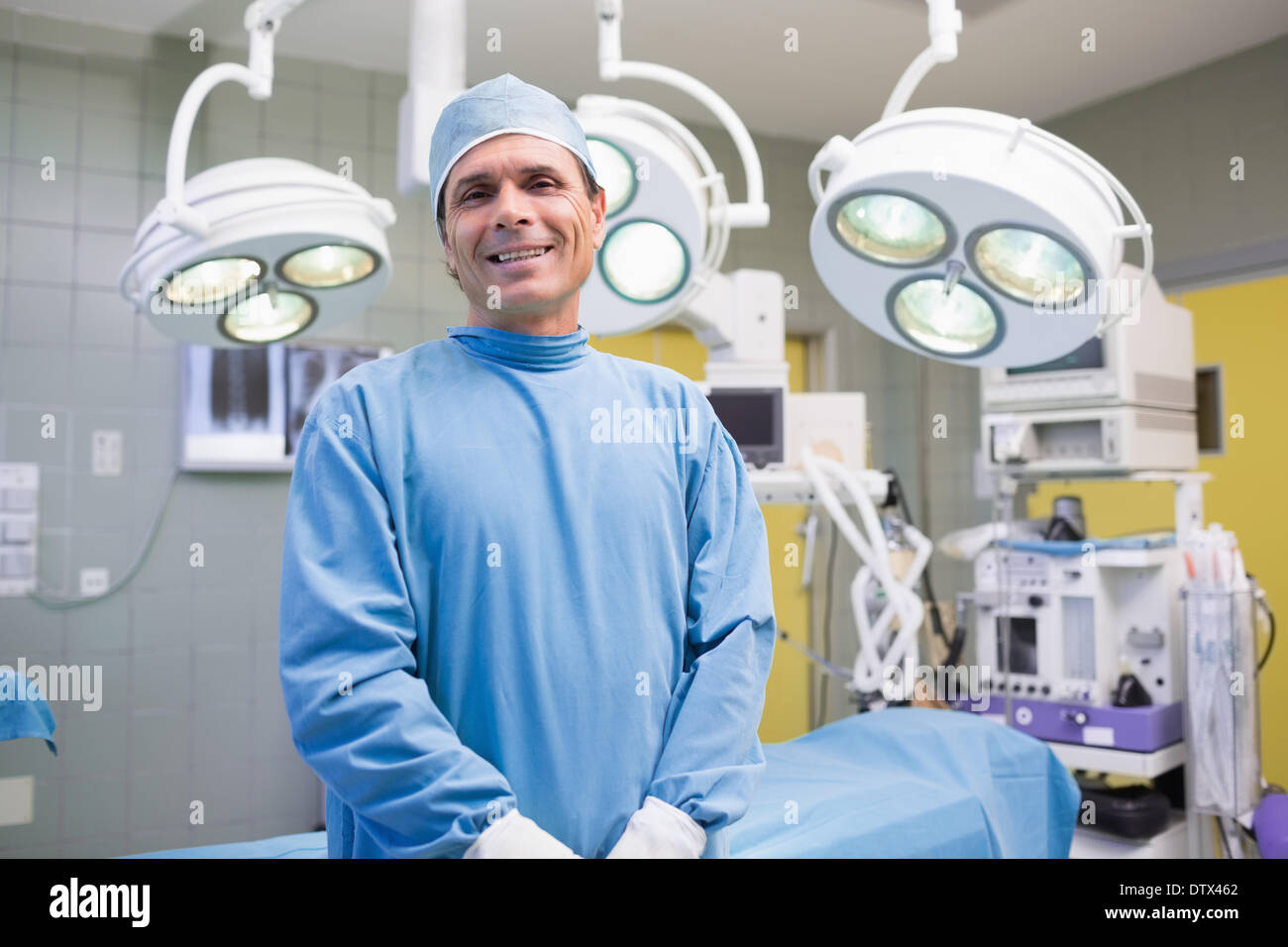 Male surgeon posing in an operation theater Stock Photo - Alamy