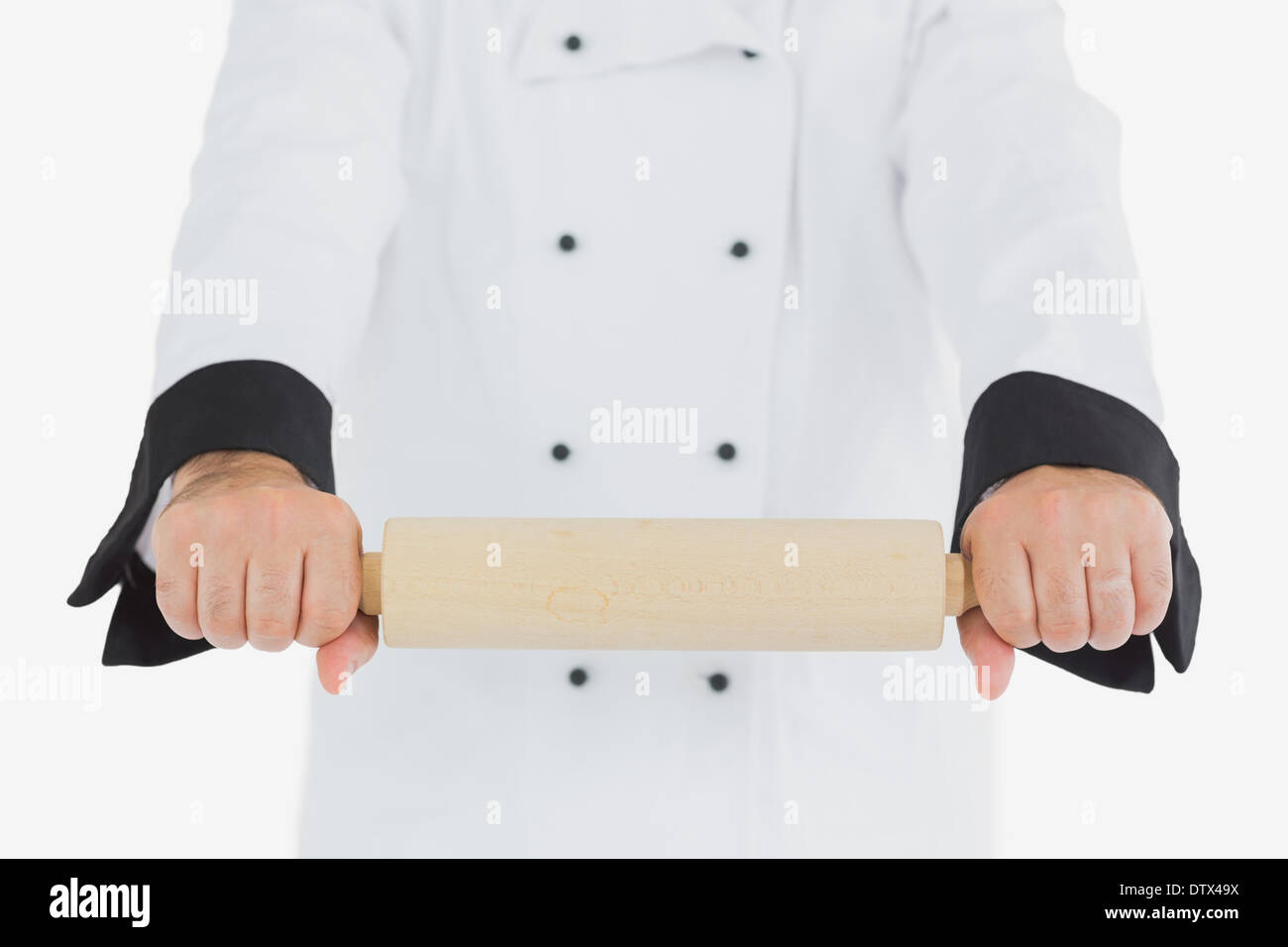 Chef using rolling pin Stock Photo - Alamy