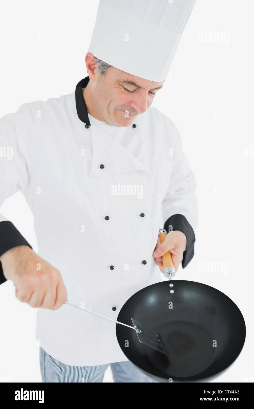 Male chef cooking food Stock Photo - Alamy