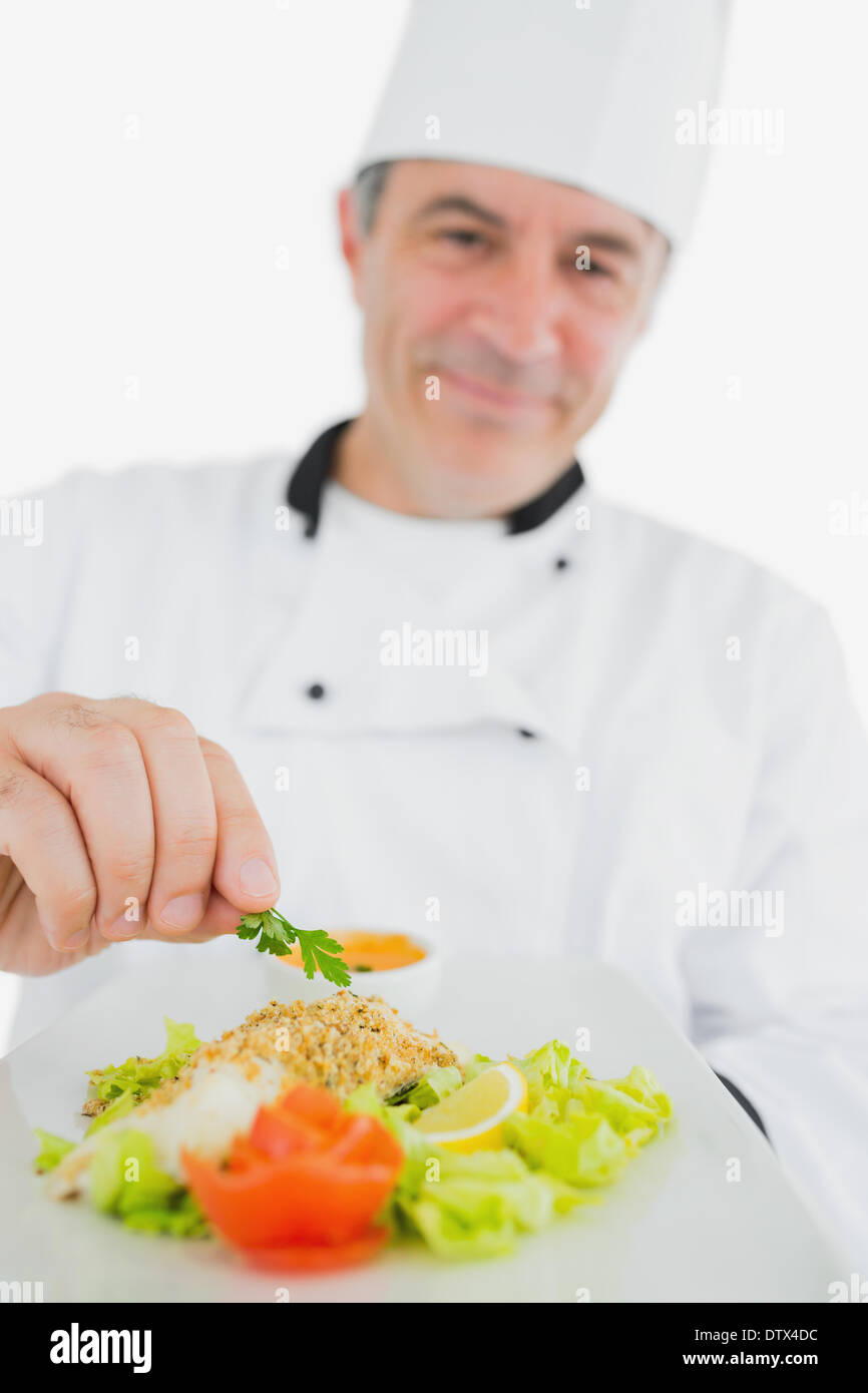 Chef presenting fresh prepared meal Stock Photo - Alamy