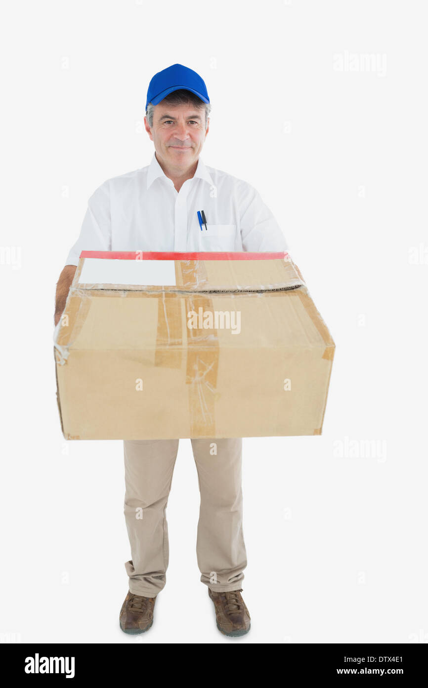 Mature courier man carrying package Stock Photo - Alamy