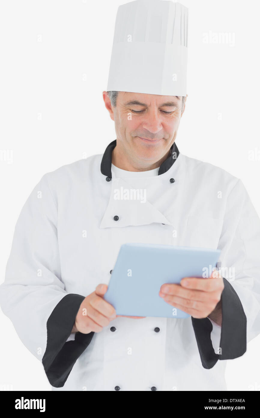 Male chef using digital tablet hi-res stock photography and images - Alamy