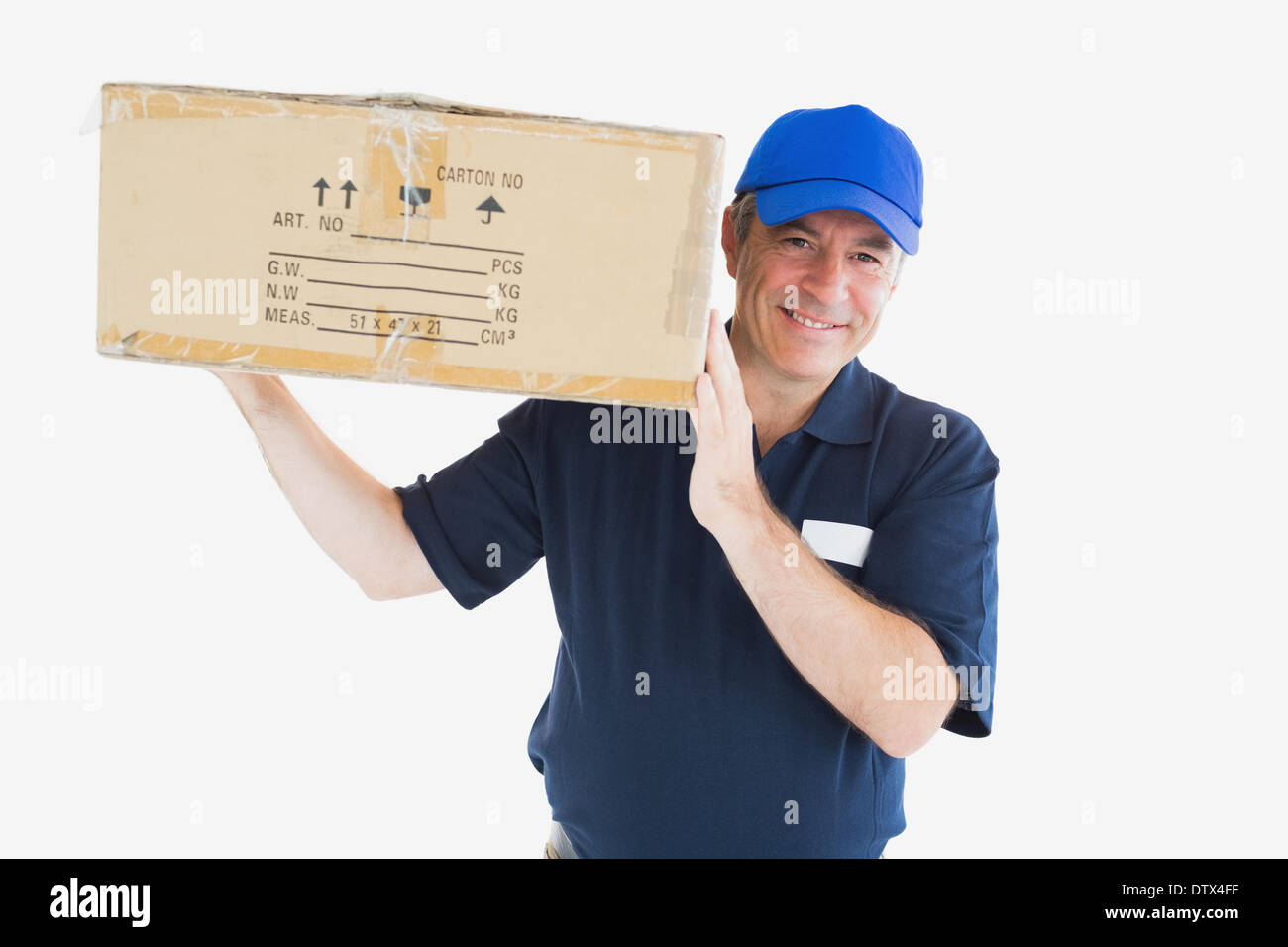 Delivery man carrying package hi-res stock photography and images - Alamy