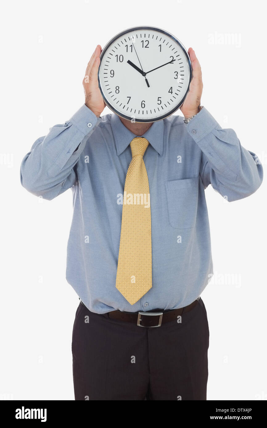 Isolated Man Hiding Face With Clock High Resolution Stock Photography ...