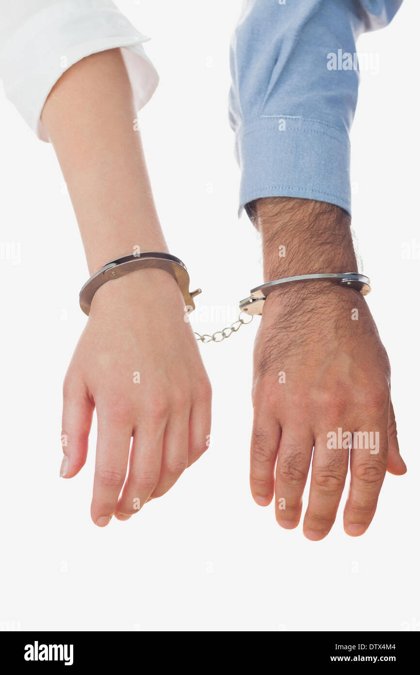 Closeup of handcuffed business people Stock Photo - Alamy