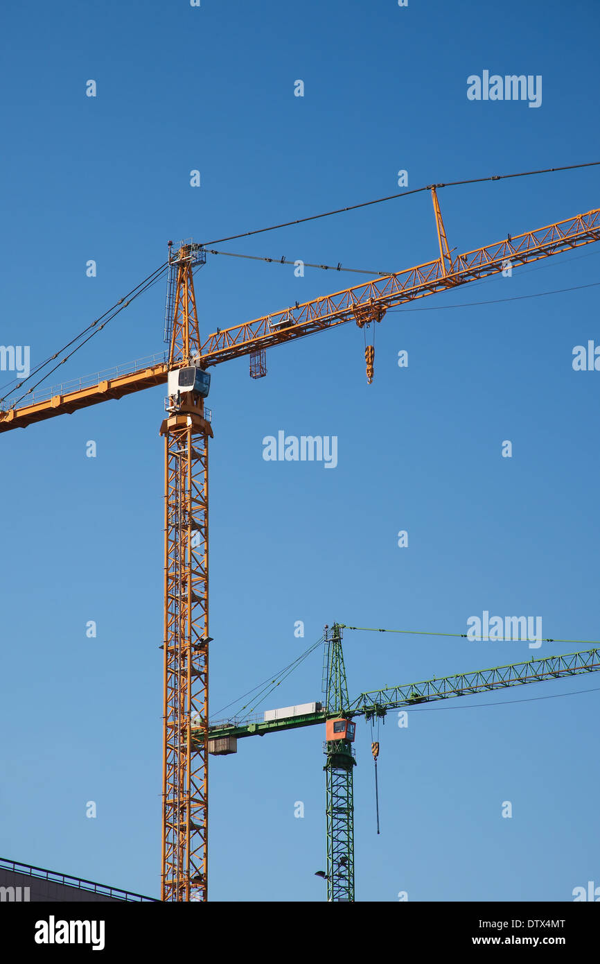 Two construction cranes above hi-res stock photography and images - Alamy