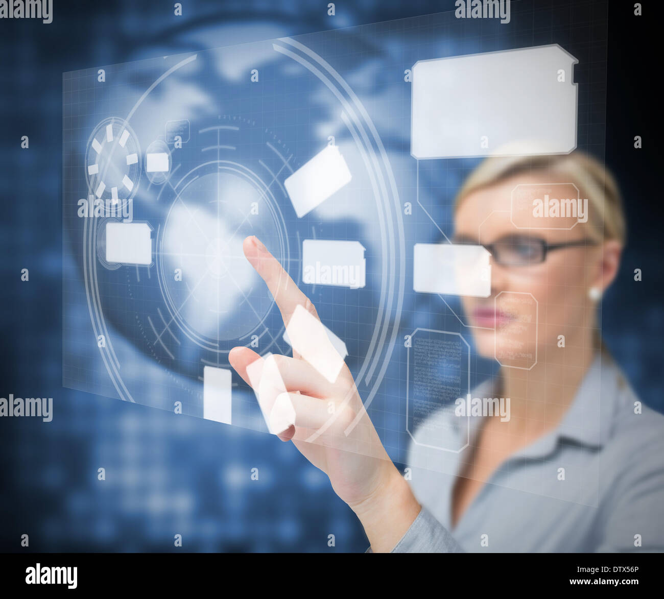 Businesswoman using touch screen Stock Photo - Alamy