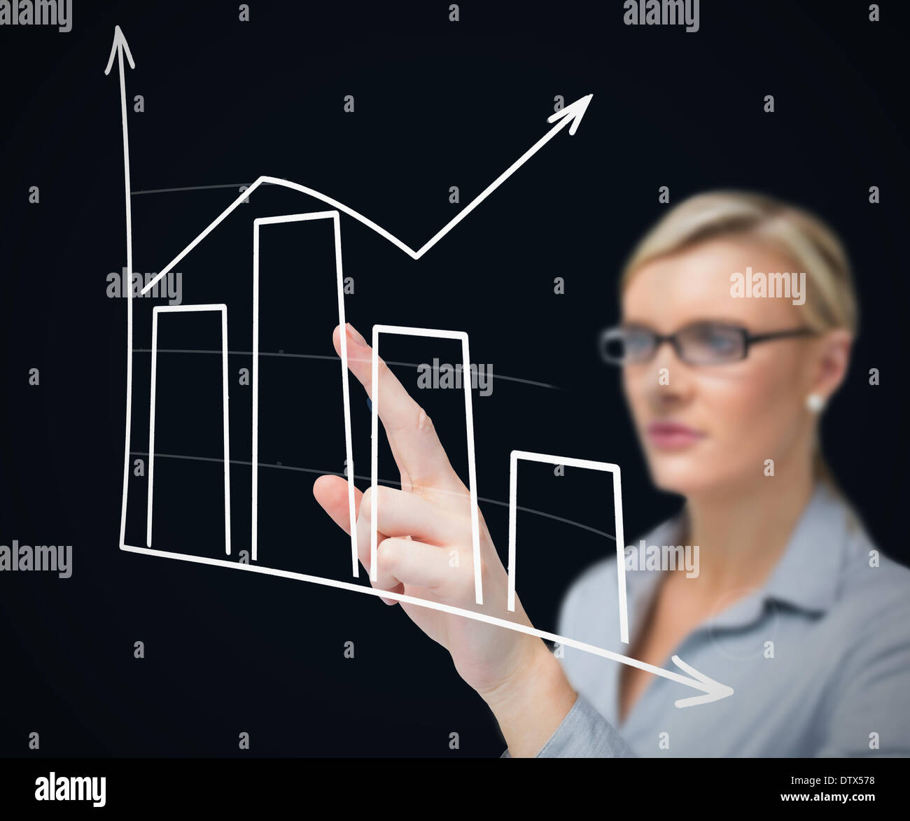 Businesswoman using graphical presentation Stock Photo - Alamy