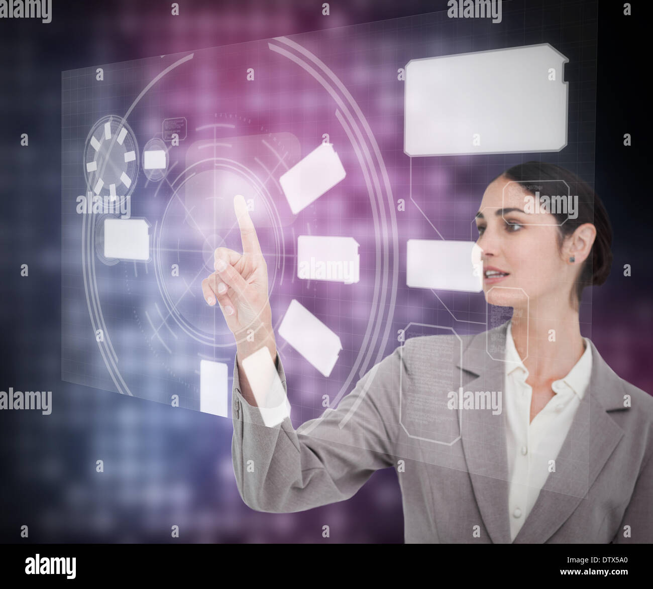 Brunette businesswoman using touch screen Stock Photo - Alamy