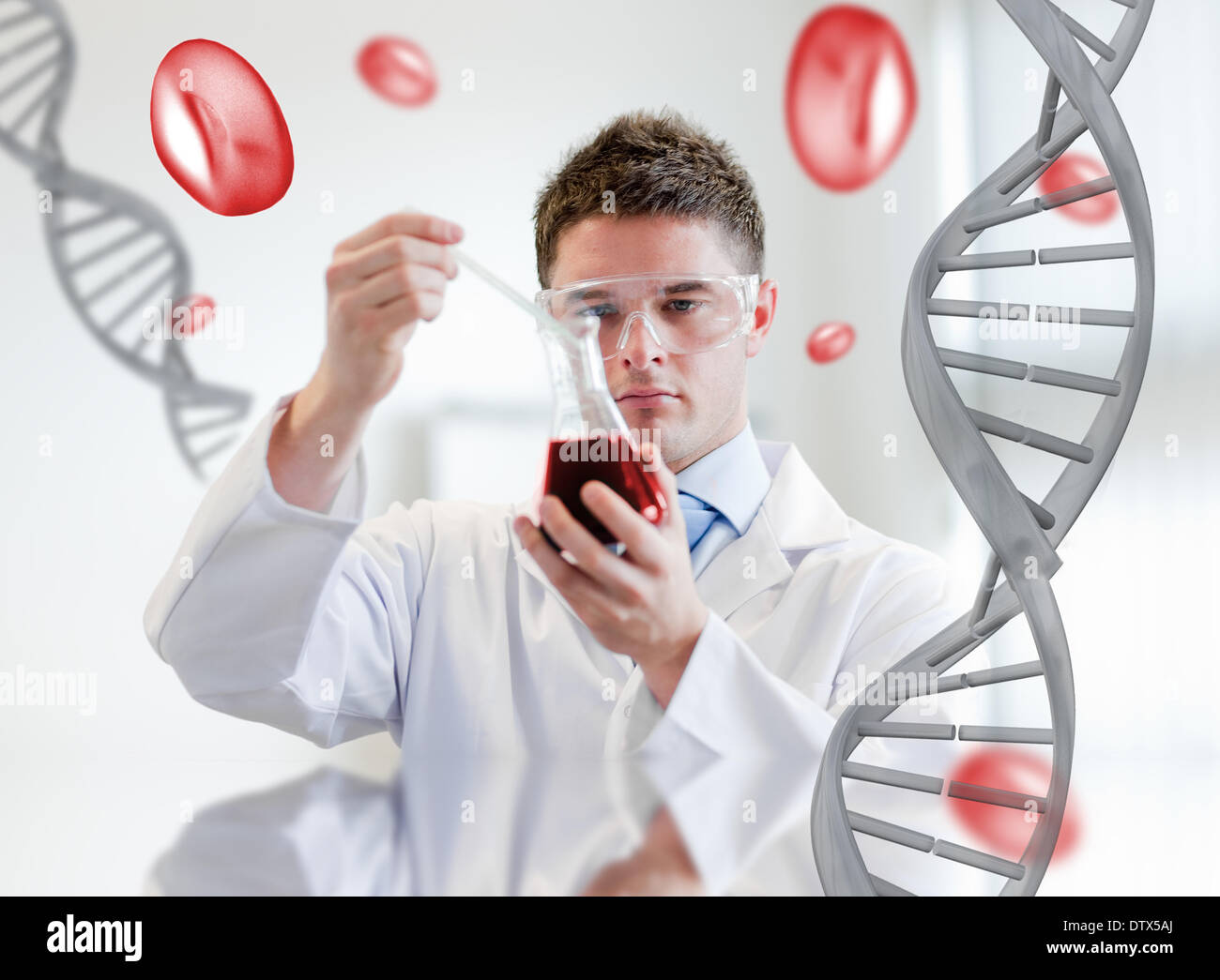 Serious chemist examining beaker hi-res stock photography and images ...