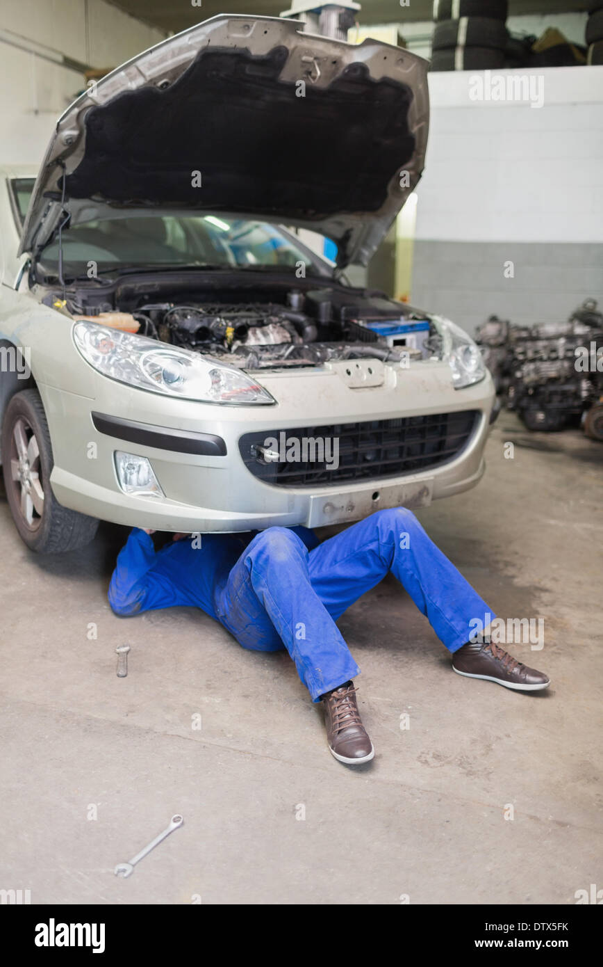 Man repairing car in hi-res stock photography and images - Alamy
