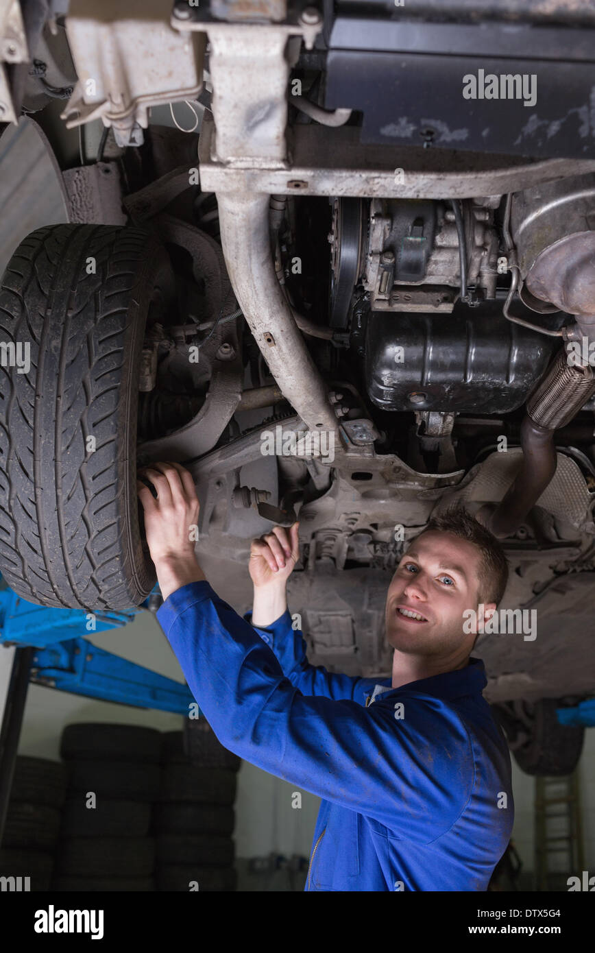 Mechanic under car hi-res stock photography and images - Alamy