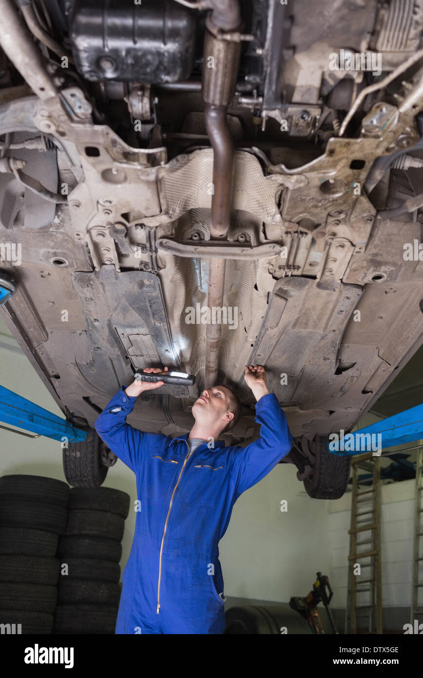 Mechanic flashlight fixing car hi-res stock photography and images - Alamy