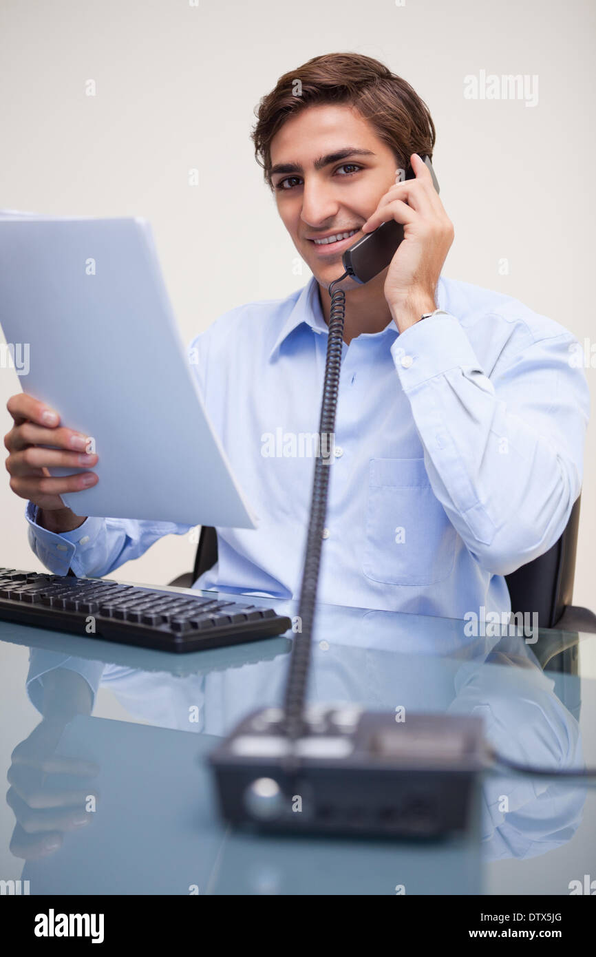 Business man holding document hi-res stock photography and images - Alamy