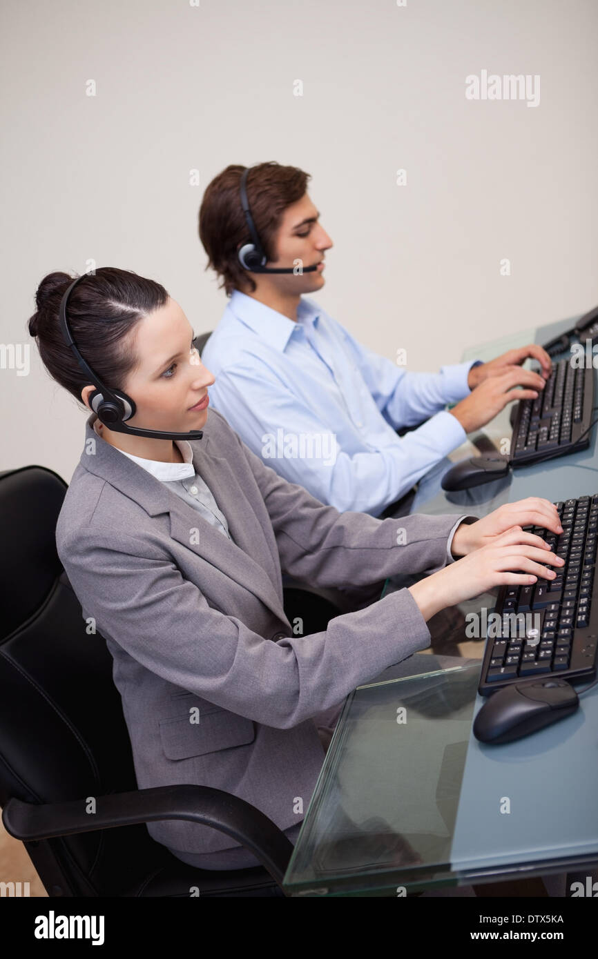 Call center employees at work Stock Photo - Alamy