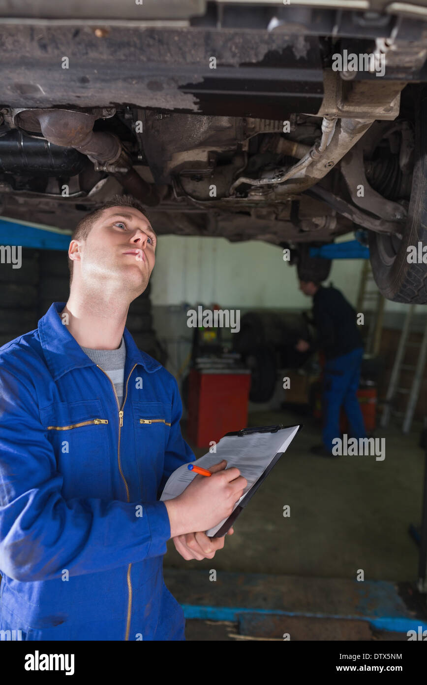 Mechanic under car on hi-res stock photography and images - Alamy
