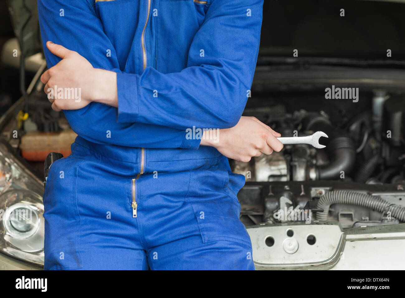 Mechanic leaning on car hi-res stock photography and images - Alamy