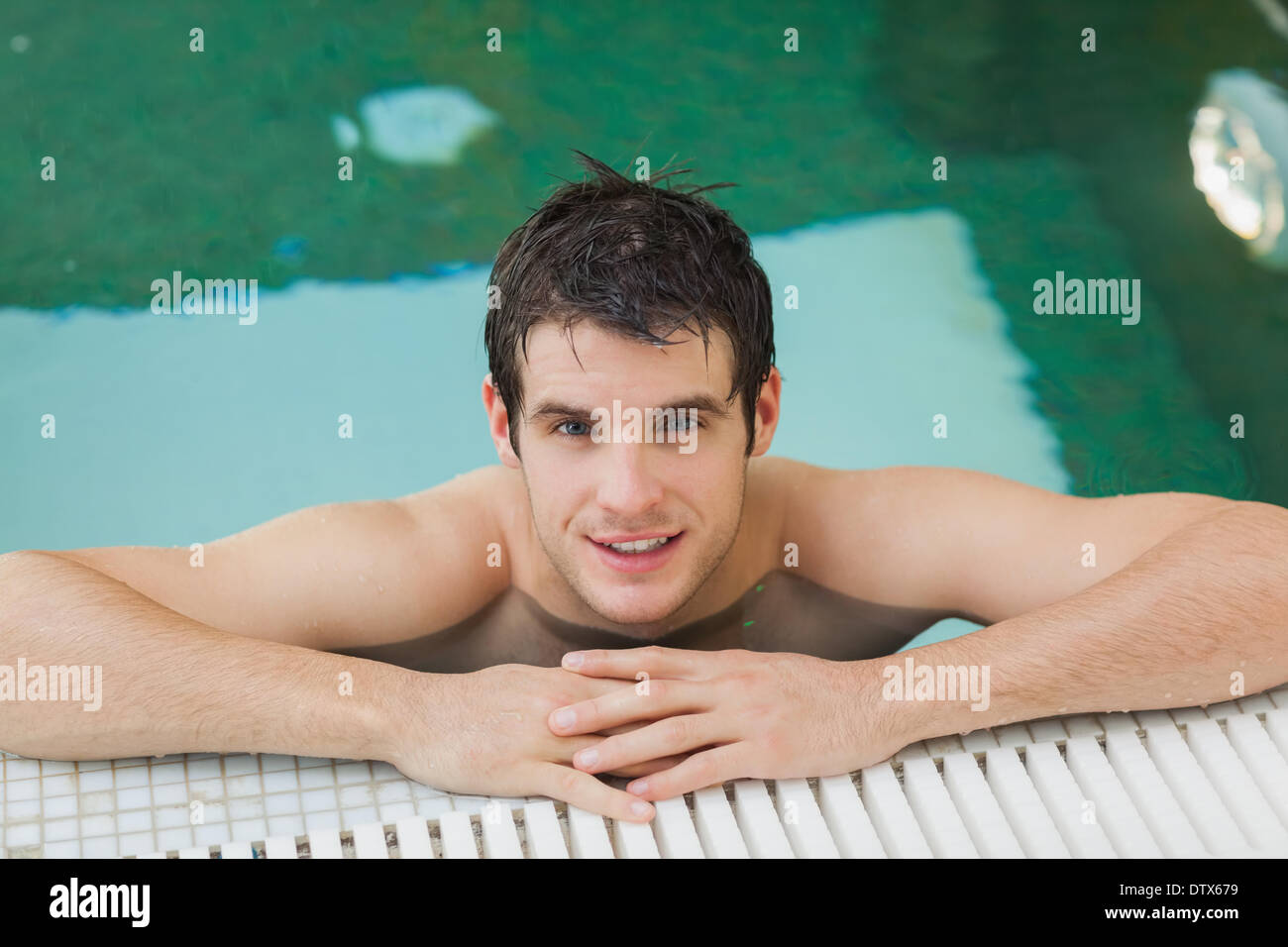 Man looking up from the pool Stock Photo - Alamy