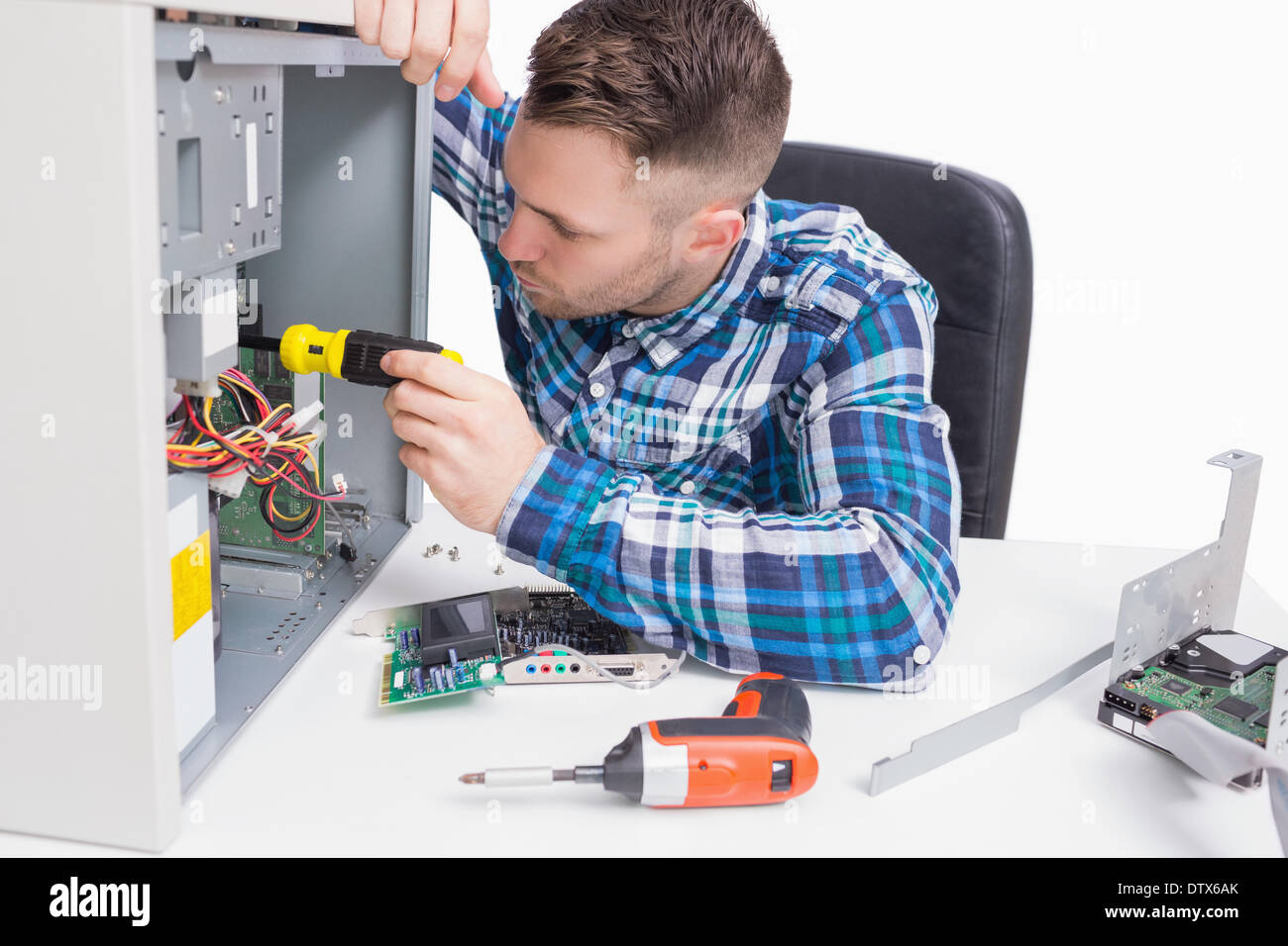 Young computer engineer working on cpu Stock Photo - Alamy