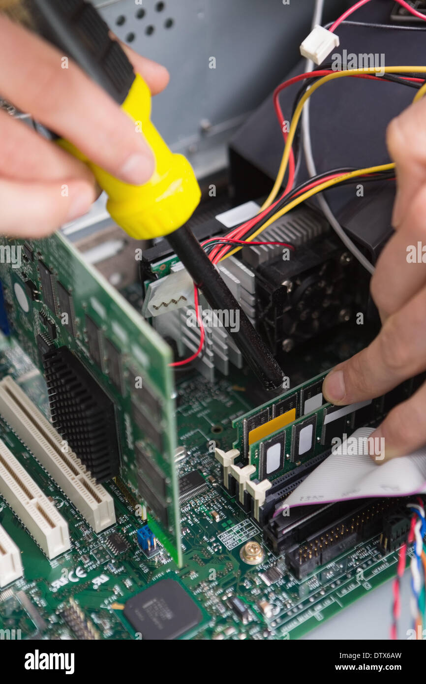 Closeup process of repairing computer Stock Photo - Alamy