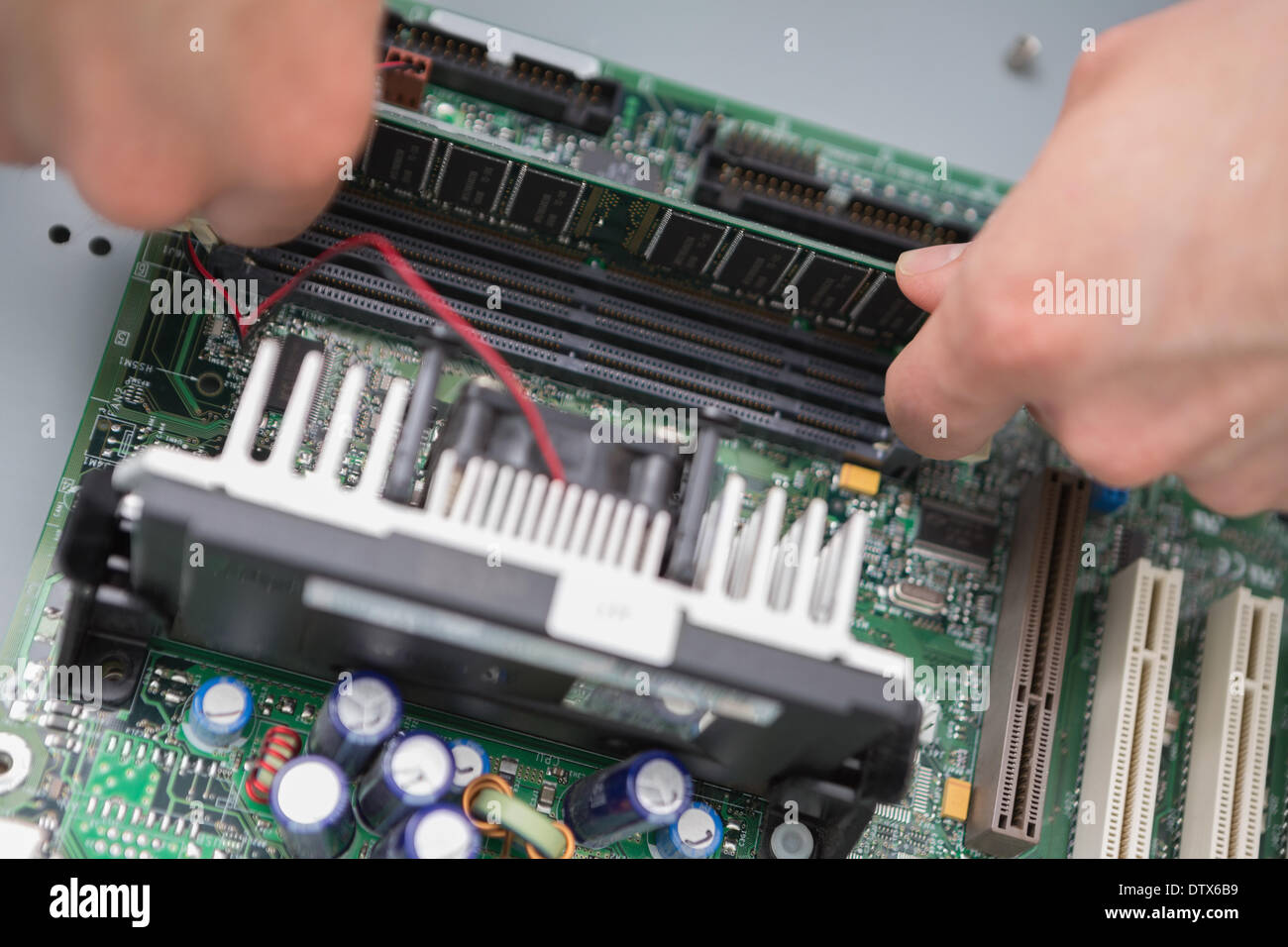 Computer engineer repairing cpu Stock Photo - Alamy
